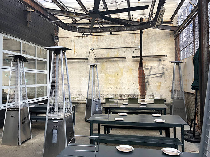 Industrial-chic outdoor seating that feels like dining in an art installation. Urban dining with a side of Fishtown cool.