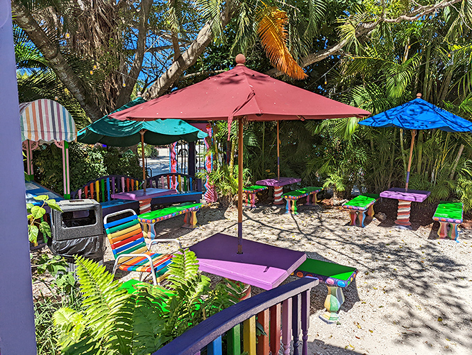 Even the outdoor seating area refuses to be boring&mdash;rainbow benches and tropical plants create a Dr. Seuss-worthy garden.