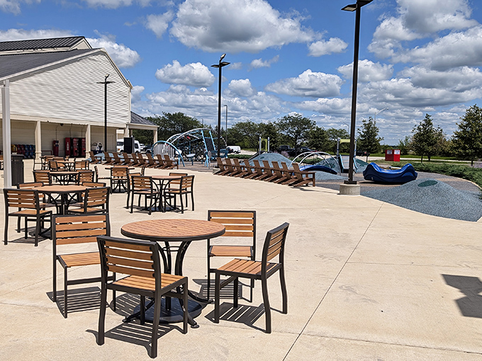 Shopping break sanctuary with a view. These outdoor tables offer respite for weary shoppers and patient partners who've reached their retail threshold.