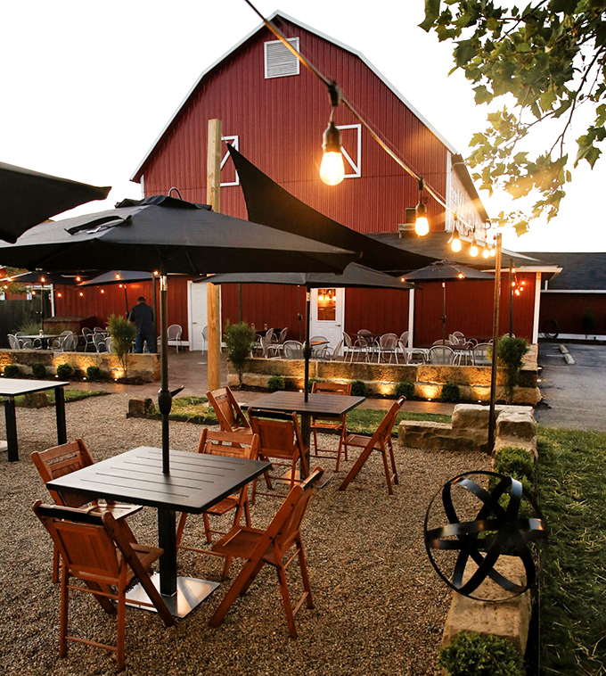 Outdoor dining under string lights with the barn as your backdrop &ndash; rural Ohio ambiance that pairs perfectly with a medium-rare steak.