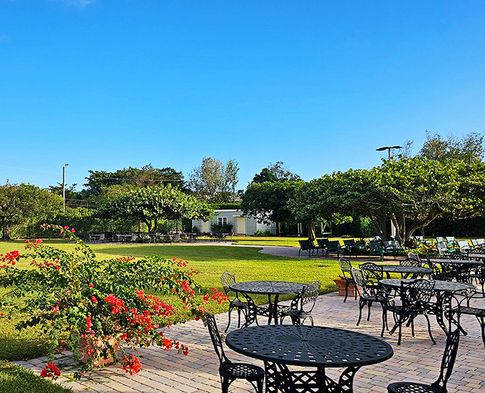 Wrought iron tables dot the patio where visitors can rest their feet while their minds continue racing with unanswerable questions.