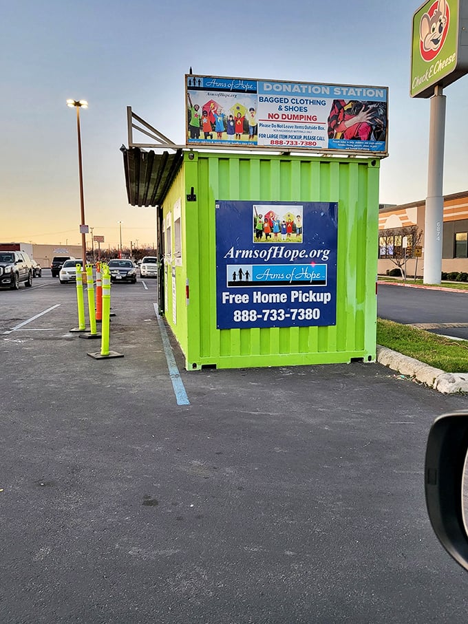 The bright green donation station stands ready to receive your cast-offs, completing the circle of thrift life in technicolor fashion.