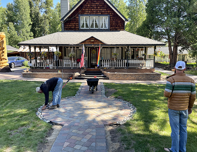 Pfauhaus Lodge showcases the kind of front porch where stories get better with each telling and nobody's checking their phone.