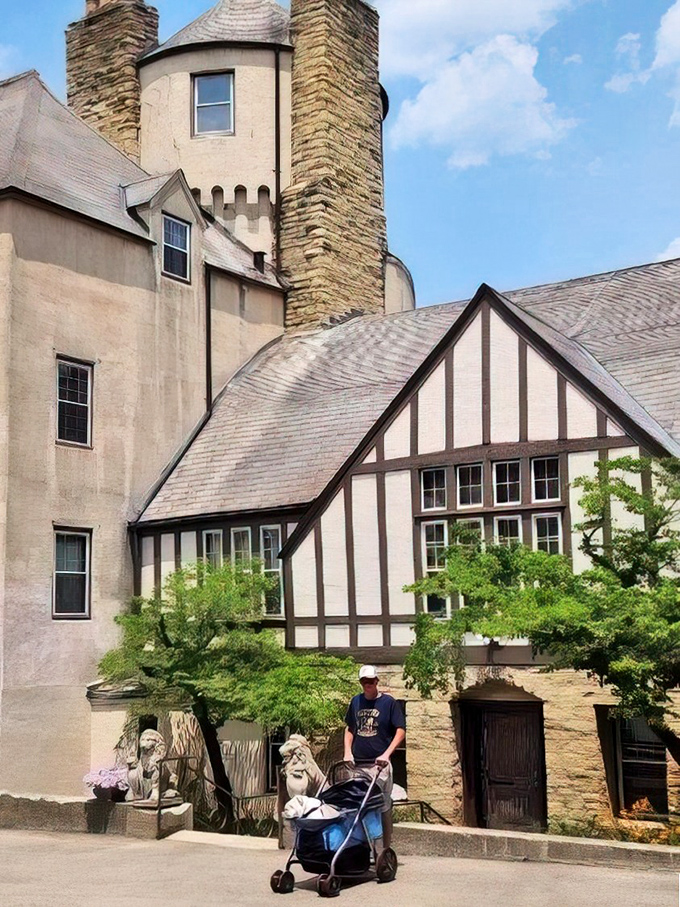 The castle's exterior combines imposing stone towers with Tudor-style wings, creating a fortress that seems plucked from European history books.