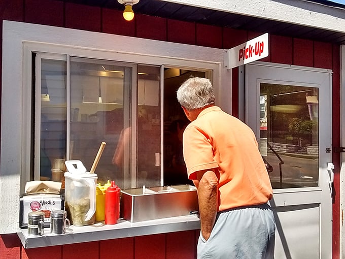 Where hopes and dreams are exchanged for paper-wrapped bundles of joy. The pickup window&mdash;Wisconsin's version of a drive-through Louvre.