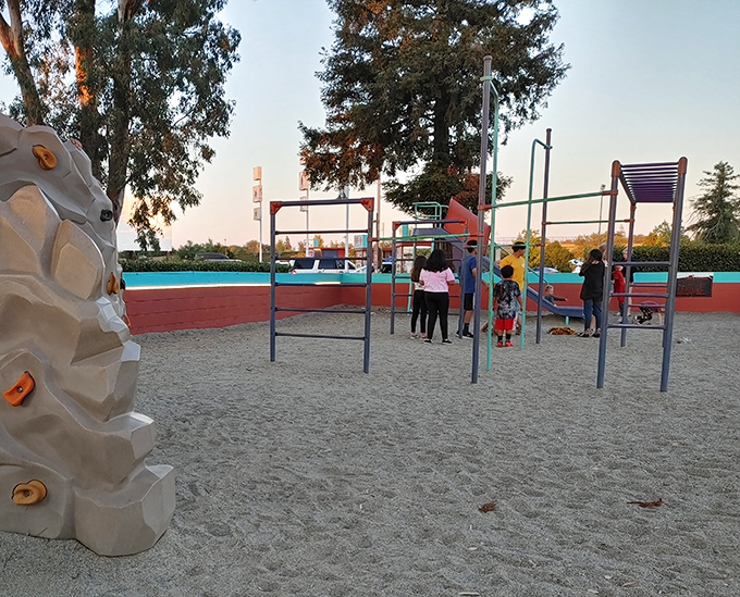 The playground offers the perfect energy release before settling in for the feature presentation. Parents everywhere silently thank the genius who installed it.