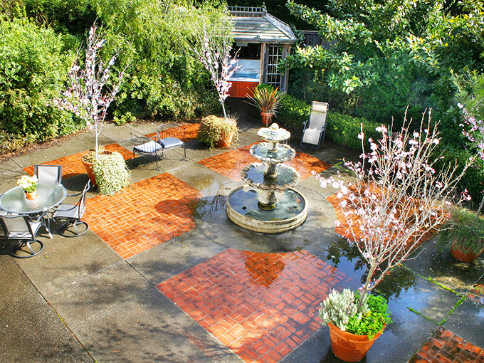 Garden serenity that invites lingering. This courtyard at Point Reyes Station Inn whispers "stay awhile" with every burble of its fountain.