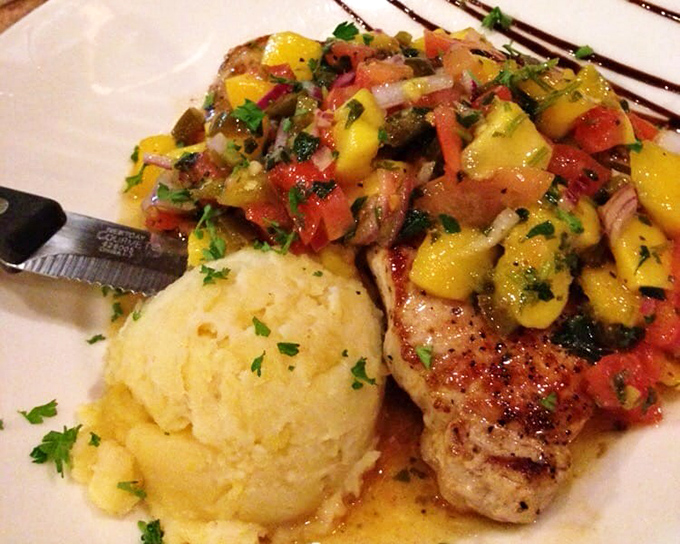 A pork chop that proves simple food done right is the highest form of culinary art. That mango salsa adds a tropical vacation to each bite.