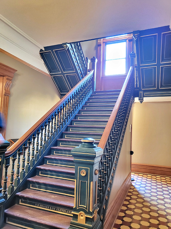 Stairs that witnessed countless journeys up and down, each step heavy with the weight of time served.