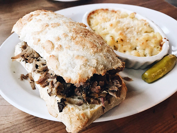 A pulled pork sandwich that doesn't need fancy tricks &ndash; just honest smoke, tender meat, and a pickle that knows its supporting role.