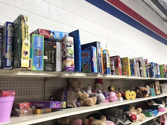 Board games and stuffed friends patiently waiting for their next family game night or bedtime cuddle session.