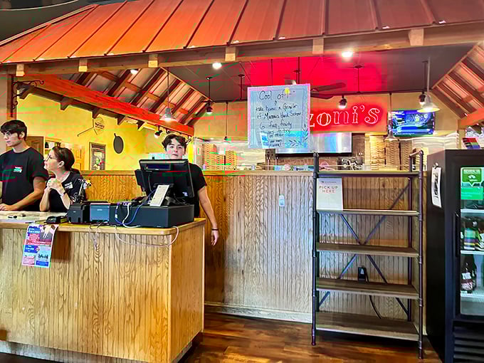 Behind every great meal is a team that makes the magic happen. The brewing tanks in the background remind you this isn't just dinner&mdash;it's craftsmanship.