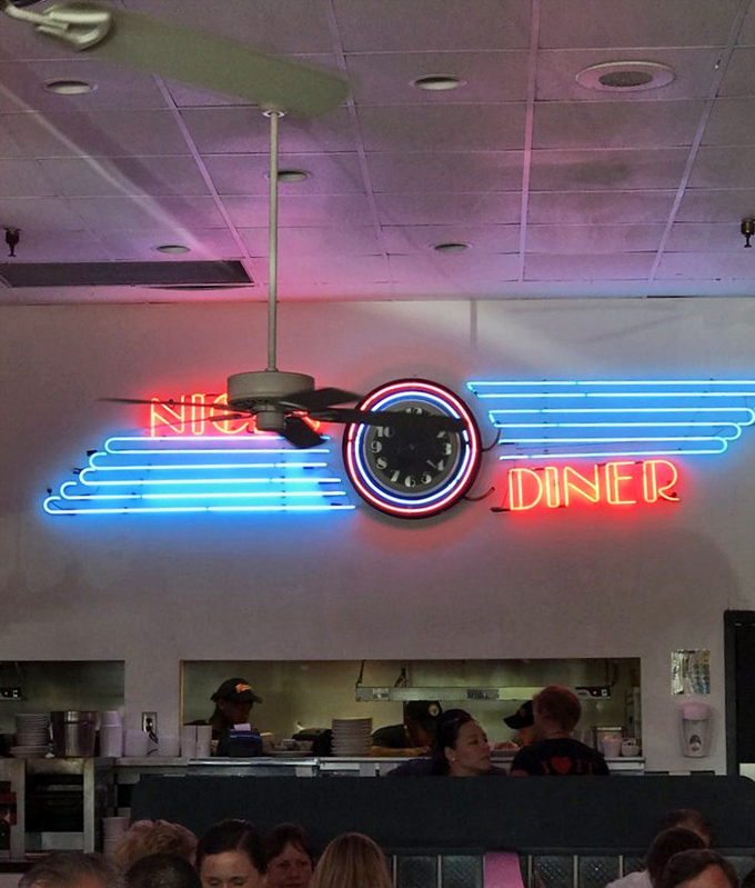 Neon lights and a vintage clock create the perfect retro atmosphere. Time actually does slow down when the food is this good.