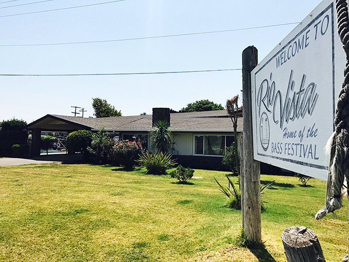 Welcome signs like this one don't just mark town boundaries&mdash;they're the first handshake in a friendship with a place that values bass and hospitality equally.