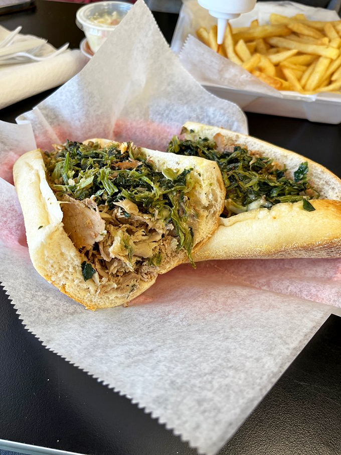This roast pork sandwich with broccoli rabe is what dreams are made of. The bitter greens cut through rich pork like a well-timed punchline.