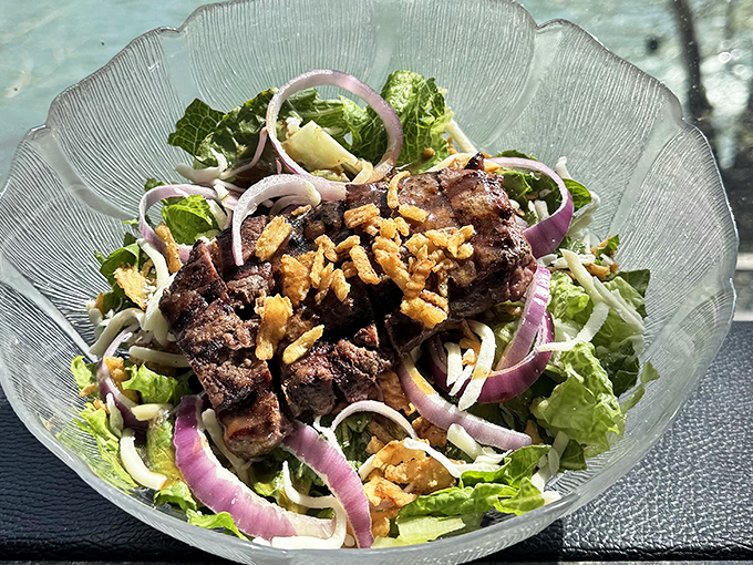This isn't just a salad&mdash;it's a protein-packed flavor festival where greens play host to perfectly seasoned steak and crunchy walnuts in perfect harmony.