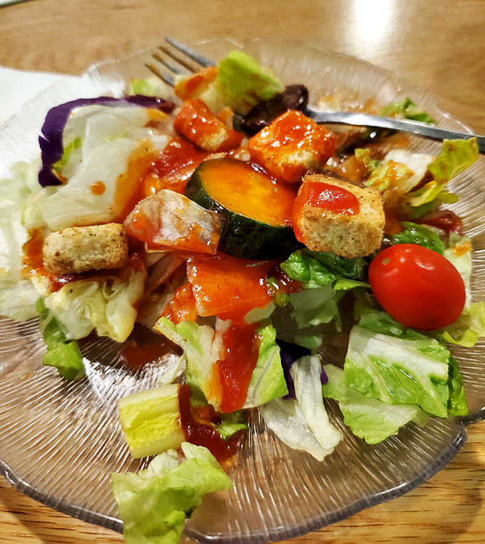 A garden salad that actually looks like someone cared about it. Not just an obligation before the meat arrives, but a worthy opening act.