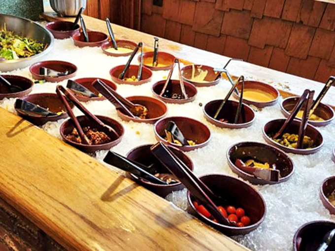 The salad bar setup that proves Smuggler's Cove understands the importance of the supporting cast in a memorable meal.