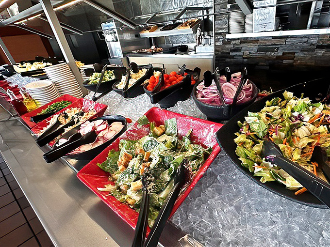 The salad bar: where good intentions meet reality. Those colorful, fresh options help justify what's coming on your second plate.