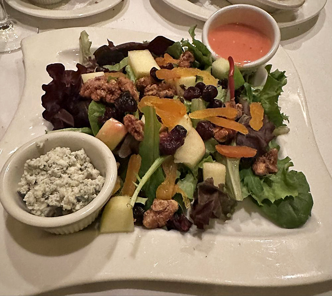 A salad that doesn't apologize for being a salad. With nuts, cheese, and dried fruit, it's the overachiever of the steakhouse menu.