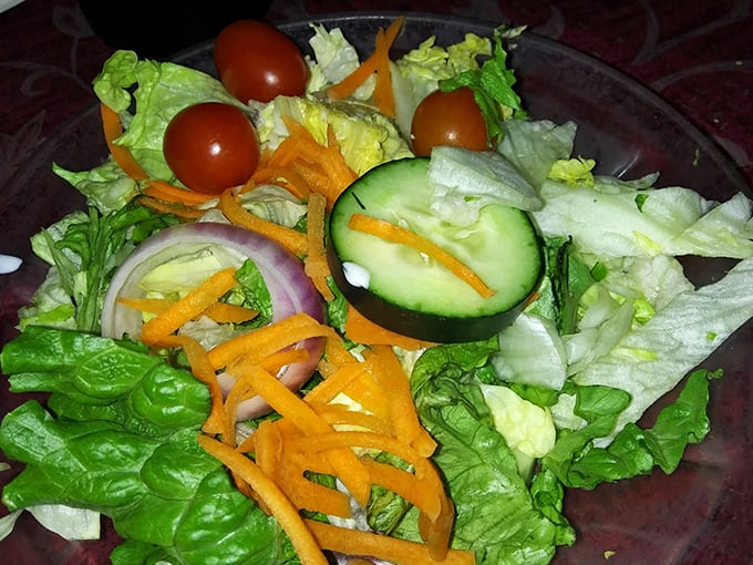 A salad that knows its role—bringing just enough freshness and color to the table without stealing the spotlight from the main attraction.