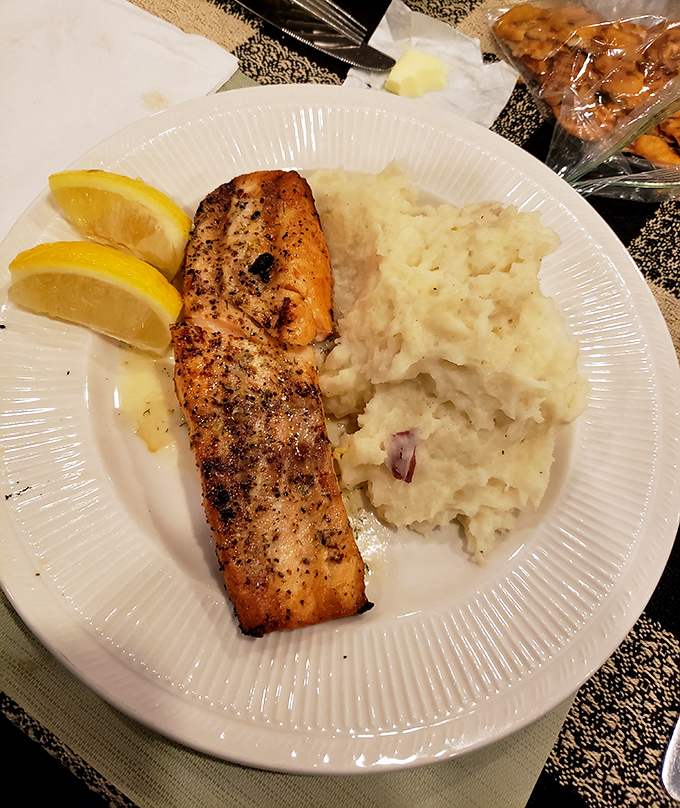 Salmon that looks like it's auditioning for a seafood calendar shoot. Perfectly seared and paired with mashed potatoes for a classic combination.