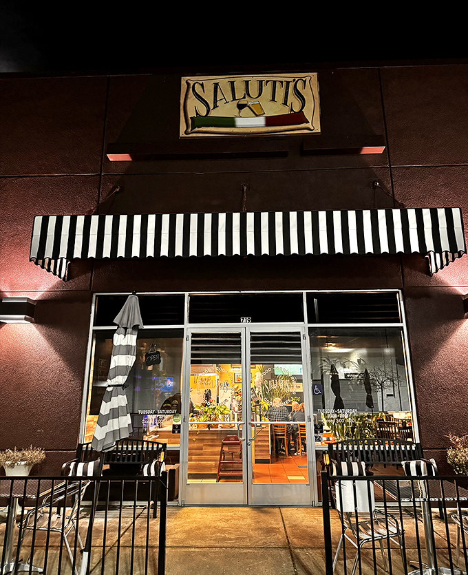 Saluti's inviting storefront promises Italian flavors without big-city prices. Those striped awnings practically whisper "come in and mangia!"