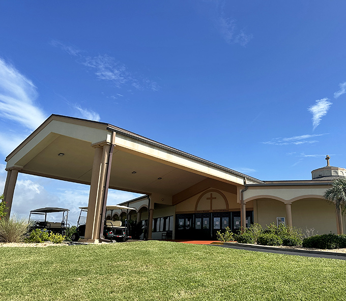 Santa Maria del Mar Catholic Church stands as a spiritual landmark against the Florida sky, welcoming worshippers and visitors alike.