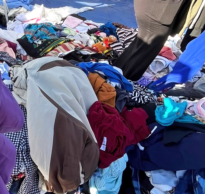 Textile archaeology at its finest—dig through these fabric layers to unearth vintage band shirts or that perfect pair of broken-in jeans.