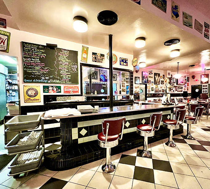 Vintage signs and memorabilia create a museum of American pop culture where your food comes with a side of nostalgia.