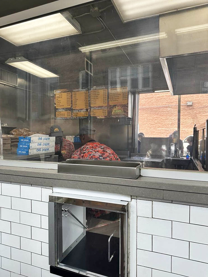 The service counter at Lem's&mdash;where dreams are ordered, wrapped in paper, and handed over with minimal fuss and maximum flavor.