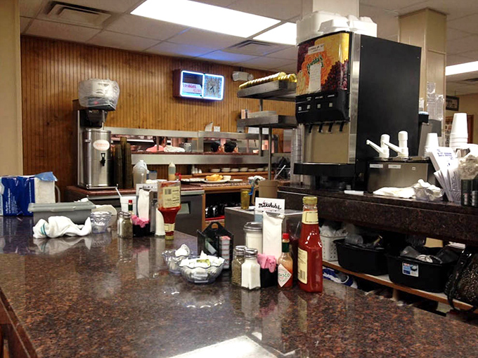 The beating heart of breakfast operations. Every condiment has its place in this symphony of diner efficiency.