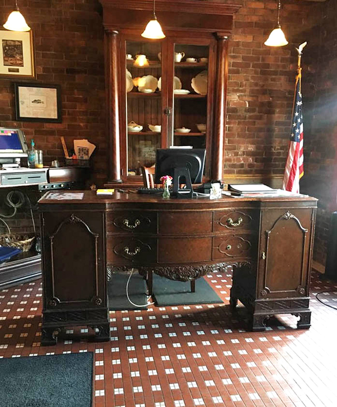 The antique desk serving as host station isn't just furniture&mdash;it's a time machine to an era when craftsmanship mattered.
