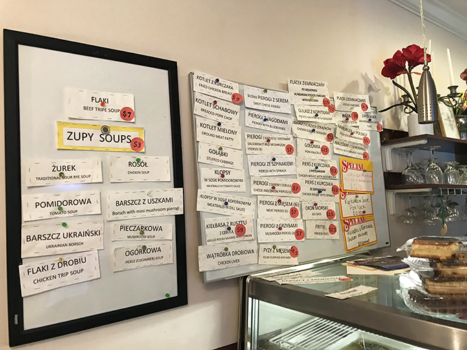 The menu board speaks the international language of deliciousness, with both English and Polish guiding your culinary journey.