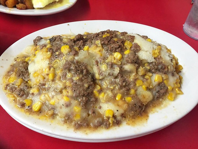 This isn't just Shepherd's Pie &ndash; it's a mountain of comfort topped with melted cheese and sweet corn, the kind of meal that makes you cancel afternoon plans.