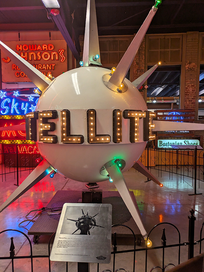 The space-age "SATELLITE" sign captures America's mid-century fascination with the cosmos, when even mundane businesses reached for the stars.