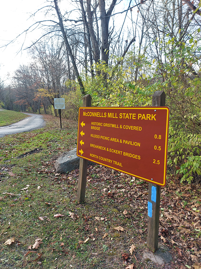 Trail markers point the way to adventure, promising picnic spots, historic structures, and enough walking to justify that extra slice of pie later.
