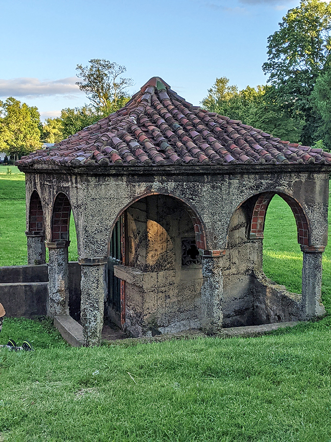This miniature folly on the grounds looks like the castle's adorable offspring, complete with its own arches and character. 