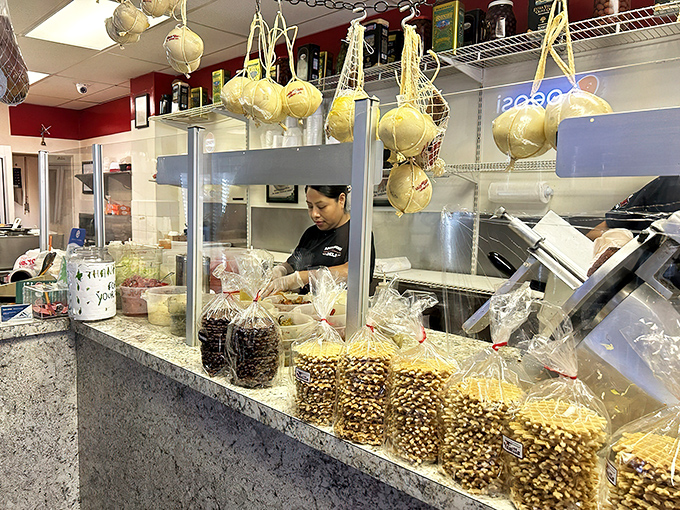 Behind every great sandwich is a dedicated team. The deli counter dance&mdash;where efficiency meets artistry in the hands of skilled sandwich architects.