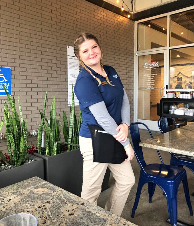 The face of hospitality&mdash;where genuine smiles and efficient service combine to make you feel less like a customer and more like a welcome guest.