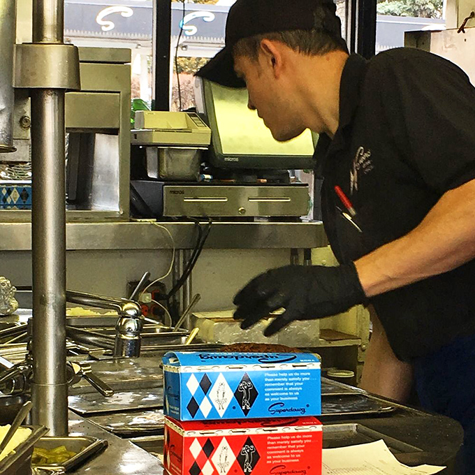 Behind every perfect hot dog is someone who takes pride in maintaining Chicago's sacred culinary traditions, one carefully assembled Superdawg at a time.