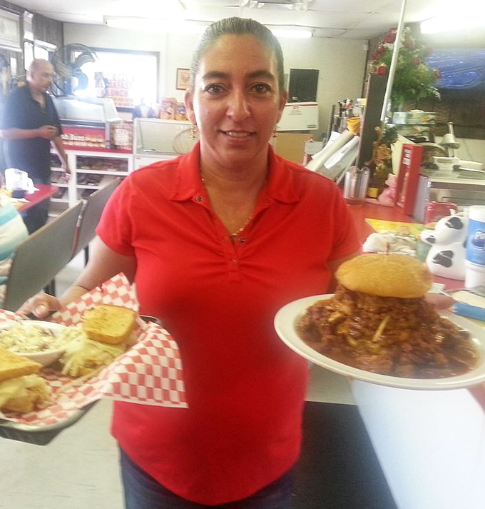 Serving up plates of happiness with a side of Florida sunshine. That smile says "I know what you're about to experience."