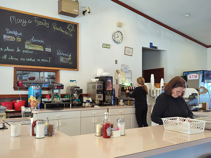 The staff moves with practiced efficiency, turning orders into meals with the choreographed precision of a culinary ballet.