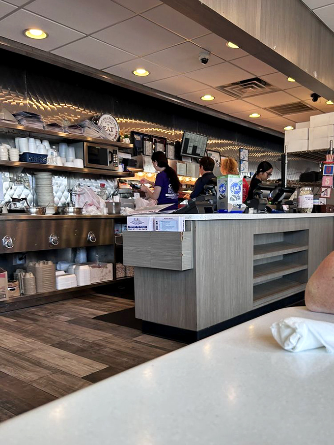 The command center where breakfast dreams become reality, staffed by professionals who can flip eggs faster than politicians flip positions.