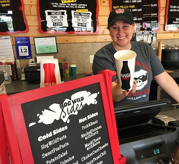 Behind every great barbecue joint is a team that understands the sacred trust between pitmaster and hungry customer. That smile says, "You're in good hands."