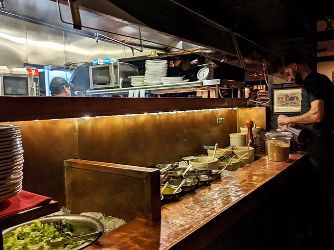 Behind every great steakhouse is a kitchen staff who understands that tradition isn't boring – it's the foundation of excellence. Culinary craftspeople at work.