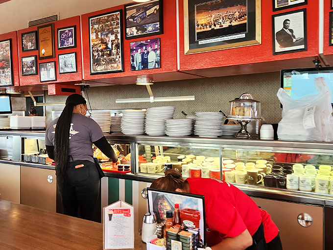 Those red walls adorned with decades of memories tell stories that no Instagram feed could ever capture.