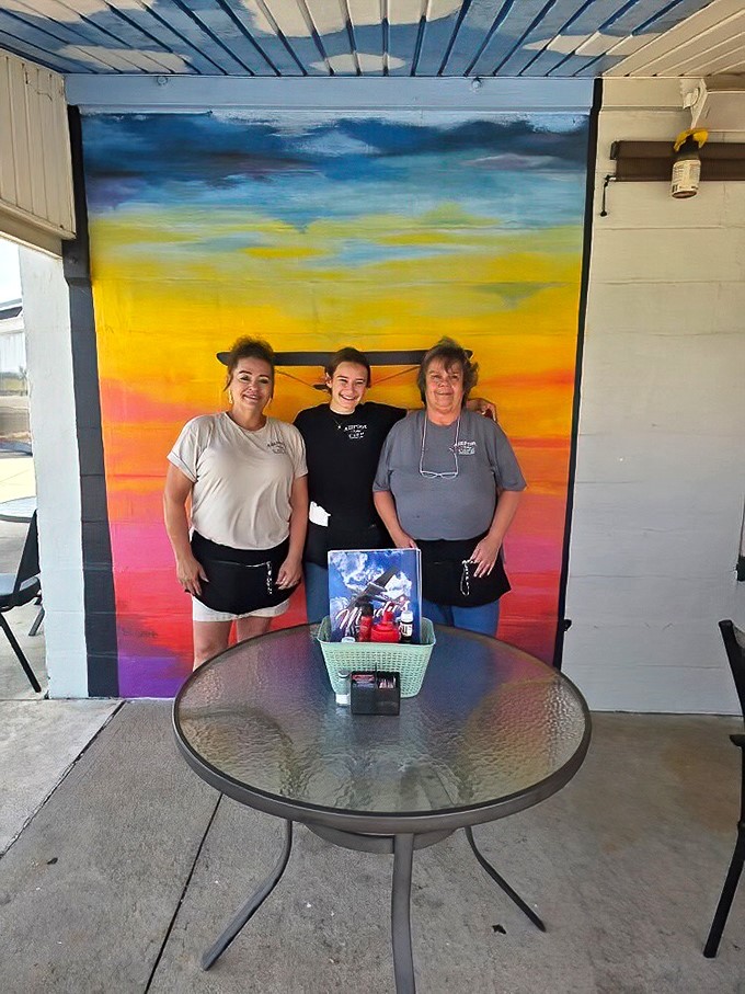 The heart and soul of any great eatery&mdash;the people who make it happen. Against that sunset mural, they're the real works of art.