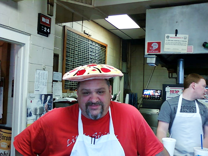 Behind every great pizza is someone who understands that food is love. That pizza hat is the crown of culinary royalty.