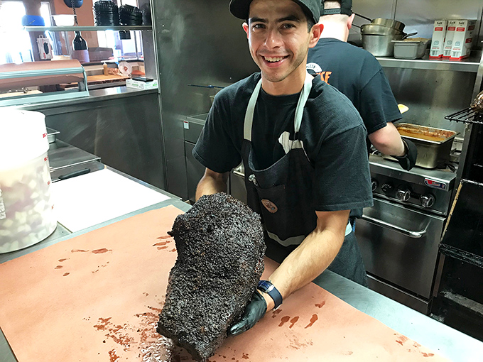 Behind every great BBQ is someone who understands the art of smoke and time. That bark on the brisket speaks volumes.